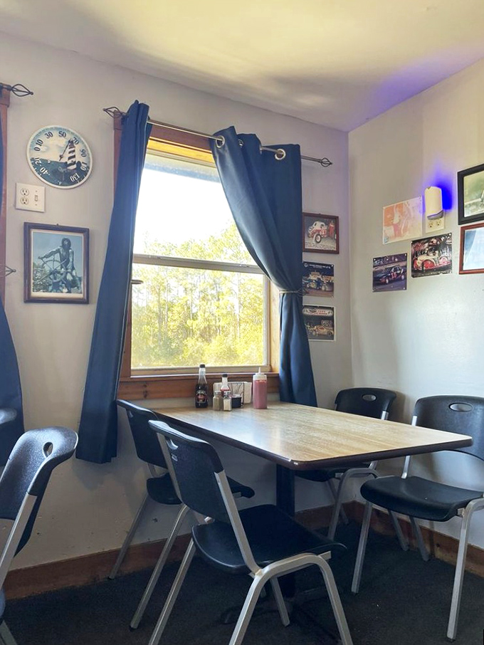 A simple table by the window where culinary magic happens. Racing memorabilia on the walls tells you this place values speed—from kitchen to table.