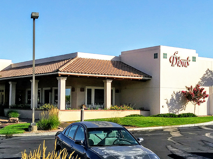 Dion's terra cotta roof and welcoming entrance scream "pizza sanctuary." This isn't just dinner—it's New Mexican pizza therapy.