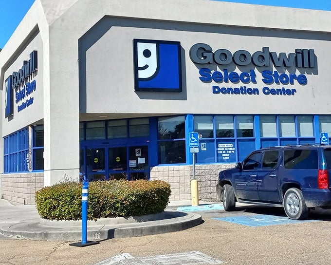 Goodwill's smiling logo promises more than just shopping—it's the gateway to a thrifter's wonderland where one person's castoffs become another's treasures.