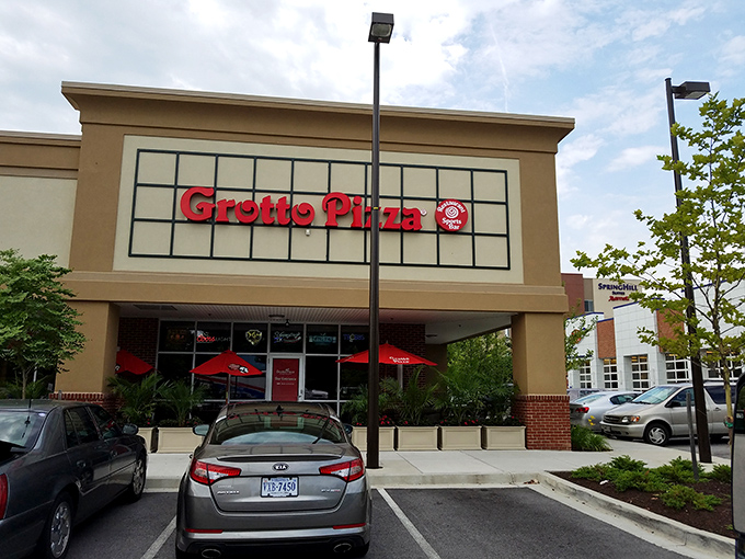Grotto Pizza keeps it simple - no distractions from their serious cheese-pulling, crust-crackling pizza mission in Columbia.