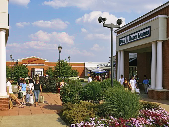 Leesburg Corner's Ralph Lauren store stands like a colonial mansion for preppy bargains. The manicured landscaping adds a touch of class to your discount hunt.