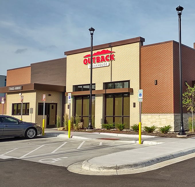 Outback Steakhouse: Clean lines, neat landscaping, and a promise of steak that doesn't require a second mortgage. The suburban dream with a side of bloomin' onion.