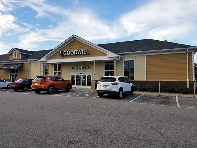 Goodwill's charming exterior belies the cavernous wonderland within—like finding Narnia behind an unassuming wardrobe door.