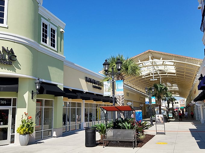 Palm trees and pastel storefronts create a shopping oasis at Tanger Outlets Charleston, where retail therapy meets coastal charm.