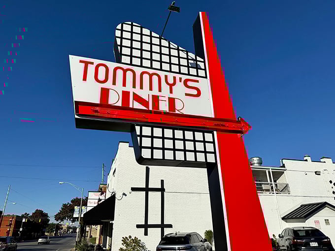 Tommy's sign stands tall against the blue sky – a mod-squad beacon calling to hungry souls across Columbus.