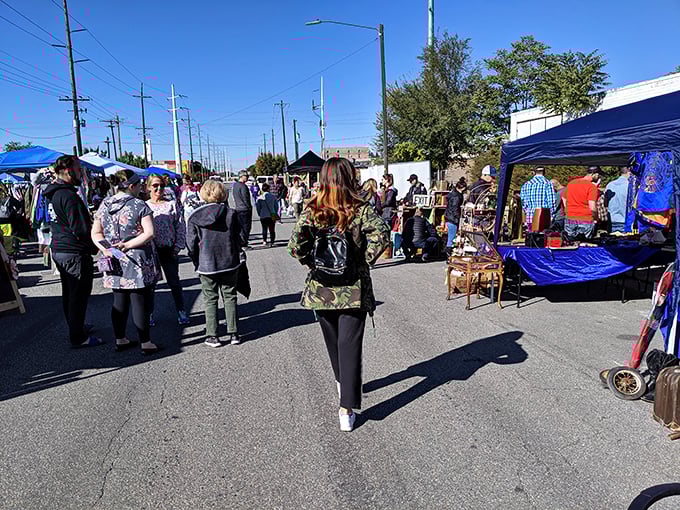 Where strangers become fellow treasure hunters. The Urban Flea Market transforms ordinary streets into aisles of possibility.
