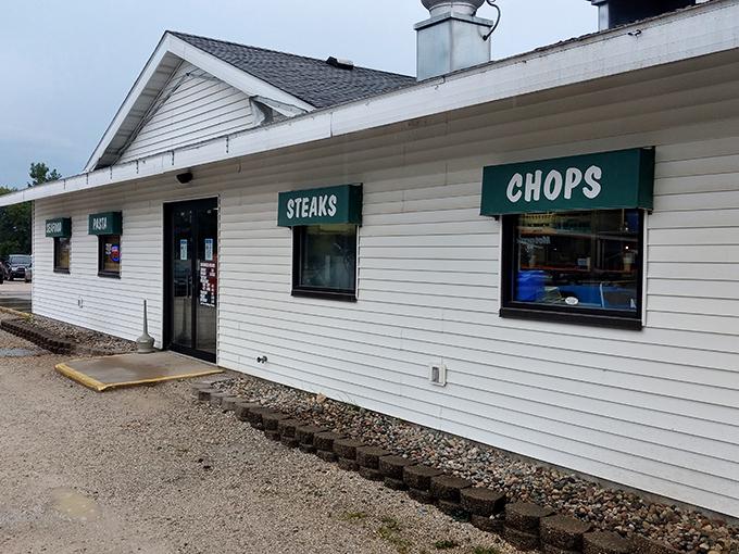 Simple white building, straightforward signs—Bill's is where the steak does all the talking. No fancy frills needed when the meat's this good!