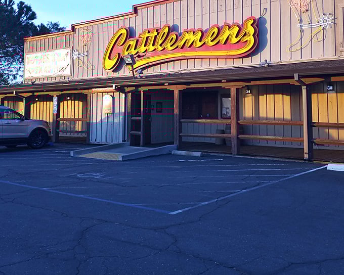 Cattlemen's wooden facade feels like stepping onto a Western movie set where the star of the show is a perfectly grilled steak.