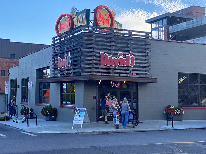 The neon sign at David's Pizza beckons like a lighthouse for the hungry souls of Spokane—a beacon of hope in a sea of mediocre chain options.
