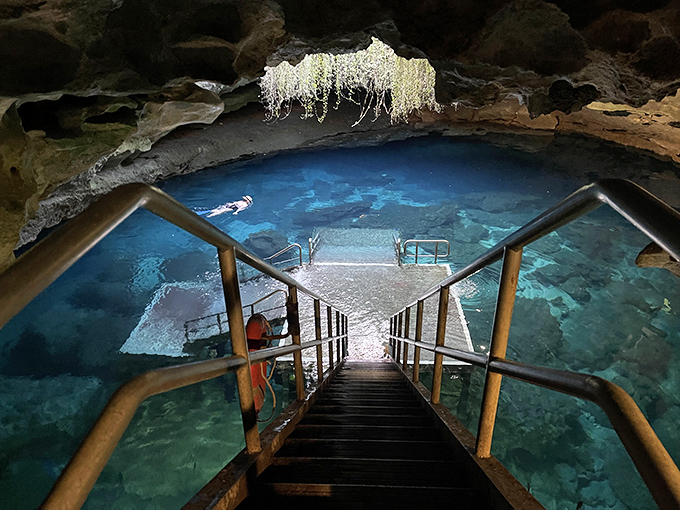 Nature's skylight illuminates this ancient swimming hole, where hanging vines create a Jurassic Park moment minus the dinosaurs.
