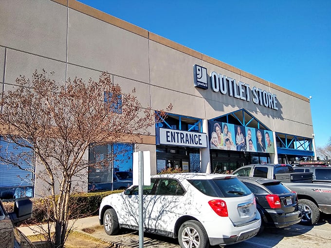 The "Outlet Store" sign promises what lies within – a bargain hunter's paradise where treasures are sold by the pound.