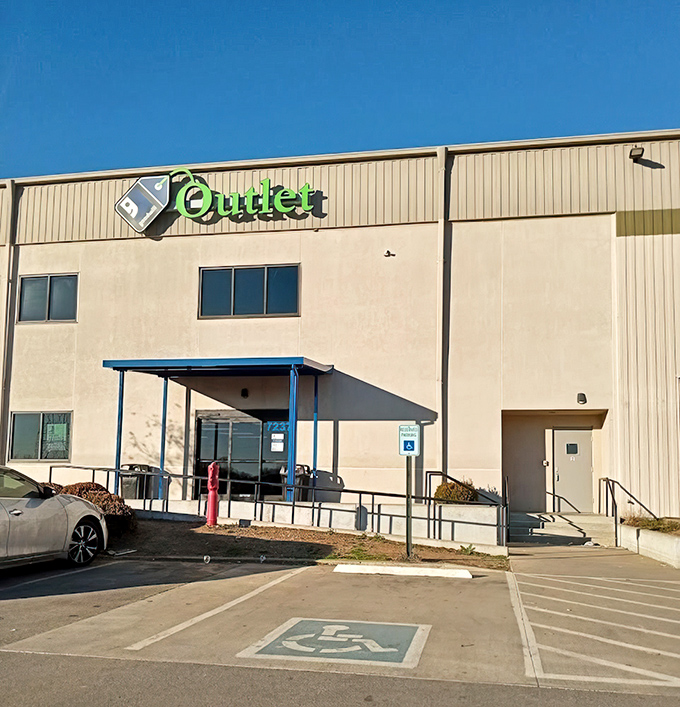 Blue awning, beige building – but inside this Goodwill Outlet lies the thrill of pay-by-the-pound adventure.