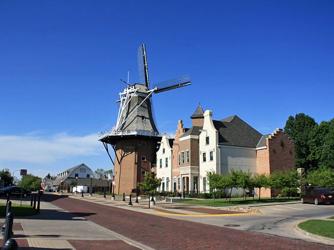 Pella's Dutch heritage shines through its distinctive architecture. That windmill isn't just for show—it's the heart of this charming community!