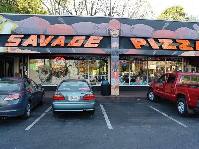 Where pizza meets pop culture! Savage Pizza's bold storefront promises an adventure for your taste buds that even Batman would approve.