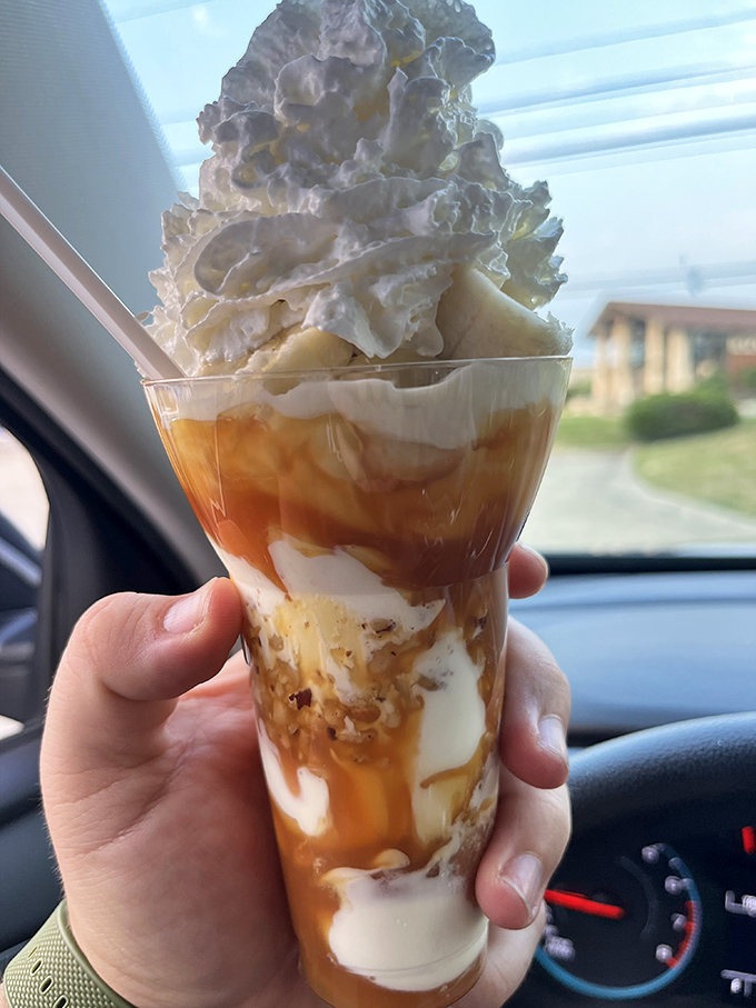 This Bananas Foster parfait isn't just dessert, it's architecture—layers of custard, caramel, and whipped cream creating the Taj Mahal of treats.