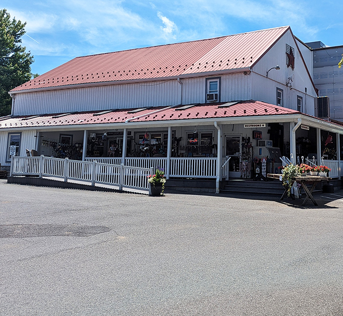 This isn't just a country store—it's a temple of temptation with a red roof, where diet plans go to die and happiness comes wrapped in wax paper.