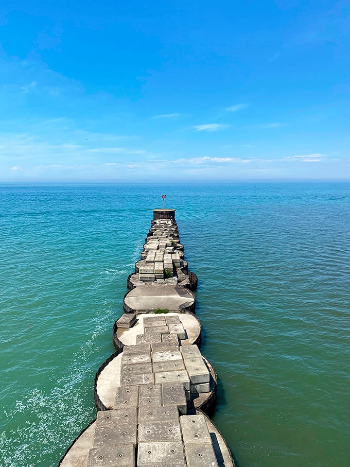 This isn't just a walkway—it's Ohio's version of the Yellow Brick Road, except it leads to a lighthouse instead of an emerald city.
