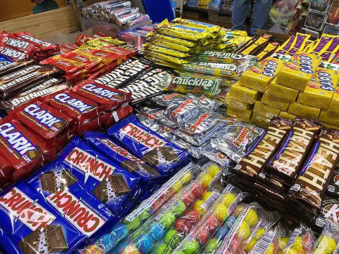 Chocolate bar heaven! Crunch, Hershey's, and Clark bars stacked with military precision, ready to deploy happiness one wrapper at a time.