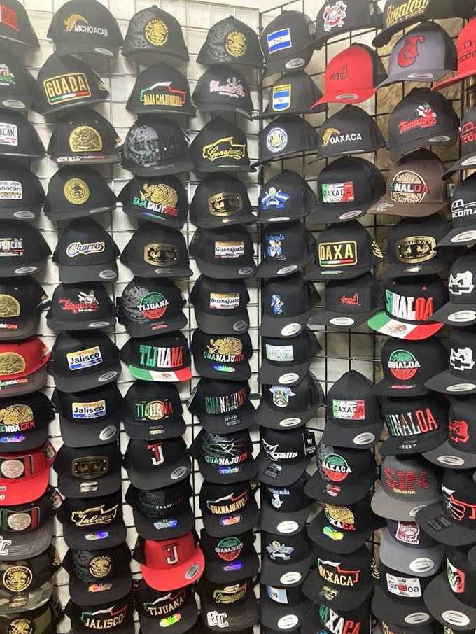 A wall of identity and heritage—these Mexican state and city caps aren't just headwear, they're wearable hometown pride for Salem's diverse community.