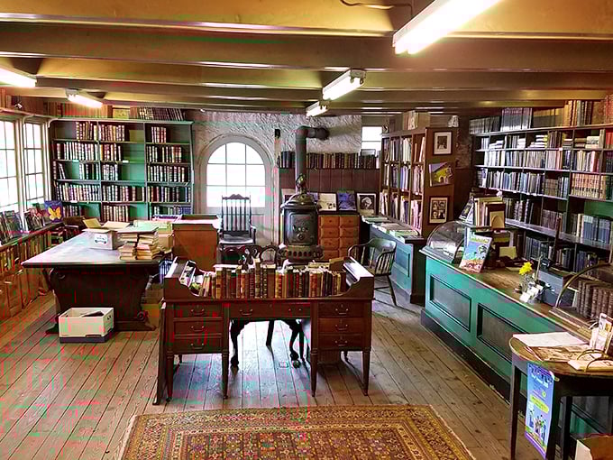 That antique desk isn't just furniture—it's mission control for literary expeditions, complete with the cast-iron stove that's warmed countless bookworms on chilly Pennsylvania afternoons.