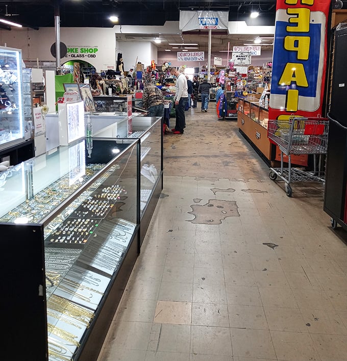 Jewelry cases glitter with possibility – each display a miniature treasure chest where someone's discarded past becomes another's prized possession.