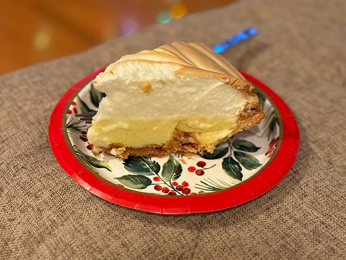 The legendary key lime pie in all its glory—tangy, sweet, and topped with a cloud of whipped cream that dreams are made of.