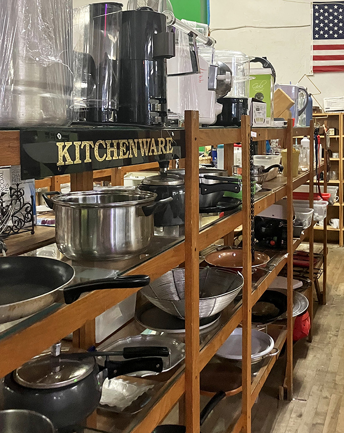 Julia Child would have a field day here – perfectly seasoned cast iron pans and coffee makers waiting for their second act in your kitchen.