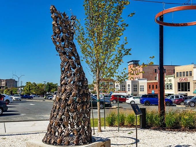 This isn't just public art—it's a community of hands reaching skyward, much like your Social Security check might do in a place this affordable.