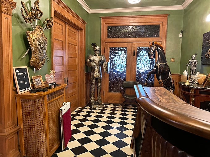 Knights stand eternal guard in the entrance hall, where the black and white checkered floor sets the stage for your royal adventure.