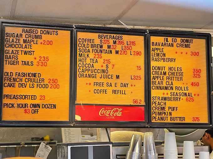 The menu board tells a sweet story of possibility—each line item a doorway to potential happiness.