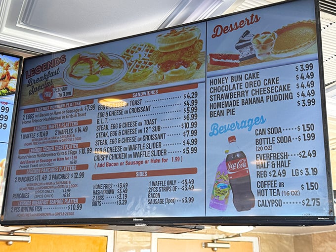 This menu board isn't just a list of food—it's a roadmap to happiness with breakfast served all day and chicken prepared with time-honored perfection.
