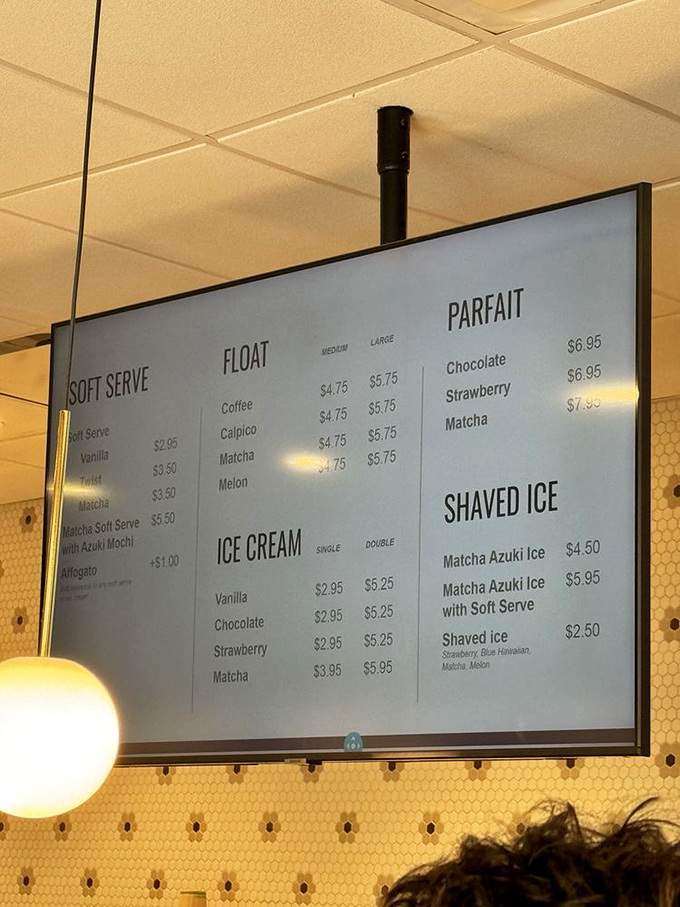 Decision paralysis has never been so delicious. The menu board tempts with floats, parfaits, and shaved ice—each promising a mini vacation for your taste buds.