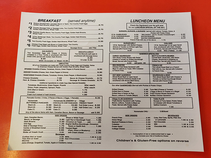 This menu isn't trying to impress anyone with fancy fonts, just honest food at prices that won't require a second mortgage.