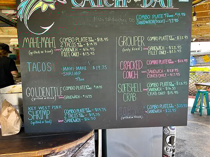 Simplicity at its finest—a chalkboard menu offering ocean-to-table delights. The handwritten specials board is like a love letter to seafood.