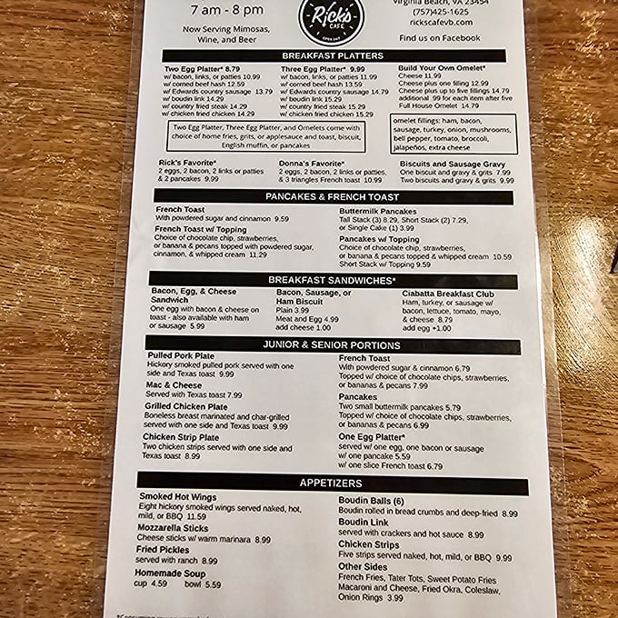 This menu reads like a love letter to morning hunger – breakfast platters, pancakes, and French toast that promise to turn your day around.