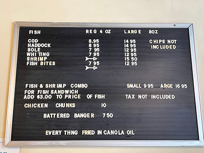 Simplicity is the ultimate sophistication. This straightforward menu board offers the essentials: cod, haddock, sole, and whiting—all fried to golden perfection in canola oil.