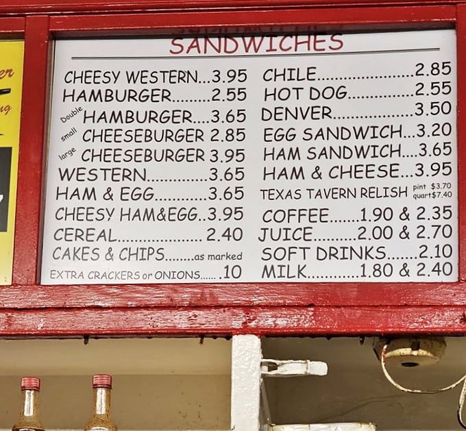This isn't a menu—it's a historical document. Decades of culinary consistency captured in handwritten prices that won't break the bank or your spirit.