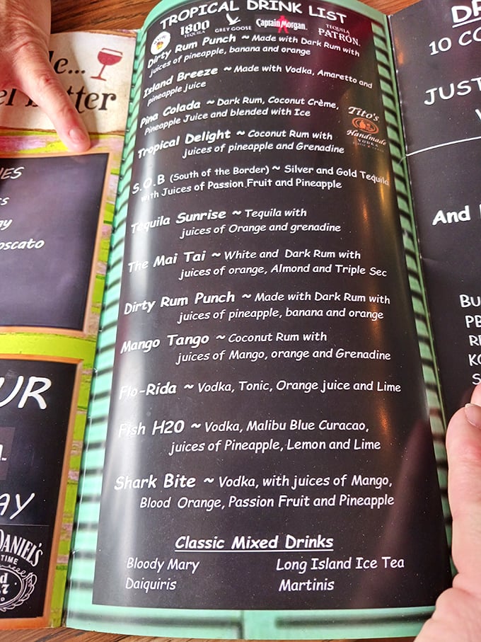The tropical drink menu reads like a vacation itinerary. That "Shark Bite" might just be the perfect companion to golden walleye.
