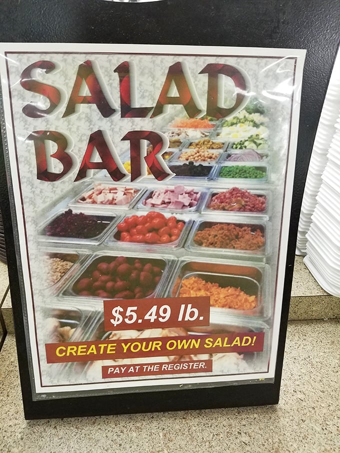 The salad bar sign promises fresh ingredients at honest prices. In the age of $20 airport salads, this is practically therapy.