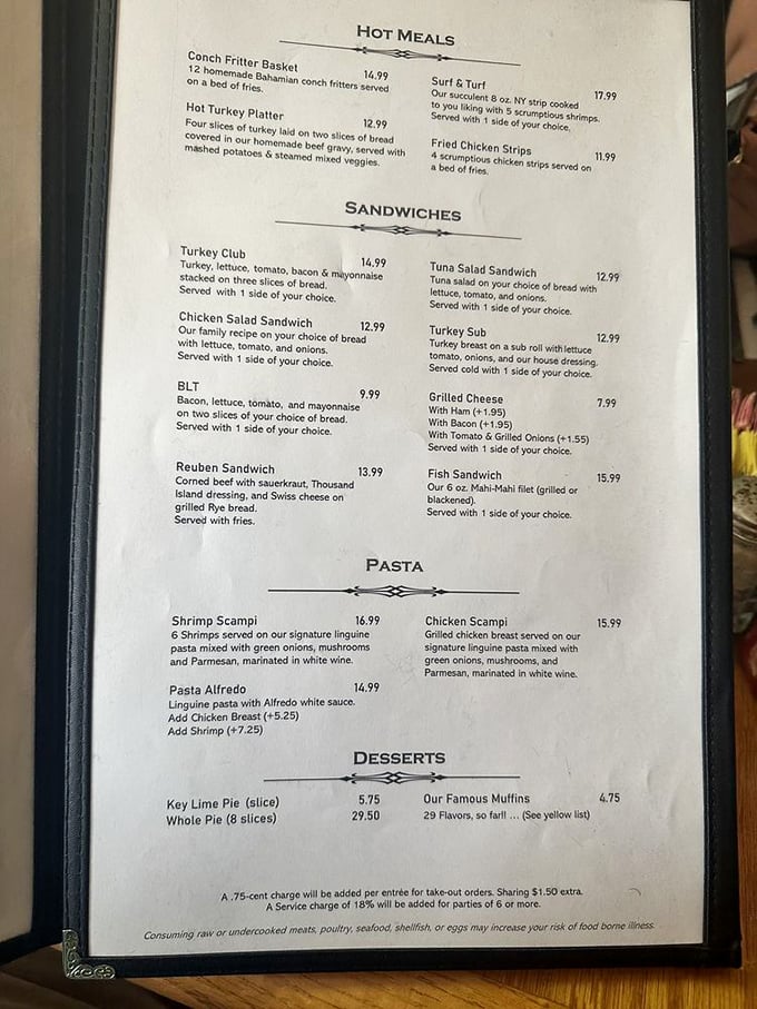 The menu reads like a love letter to comfort food – from conch fritters to Key lime pie, proving paradise isn't just about the beaches.