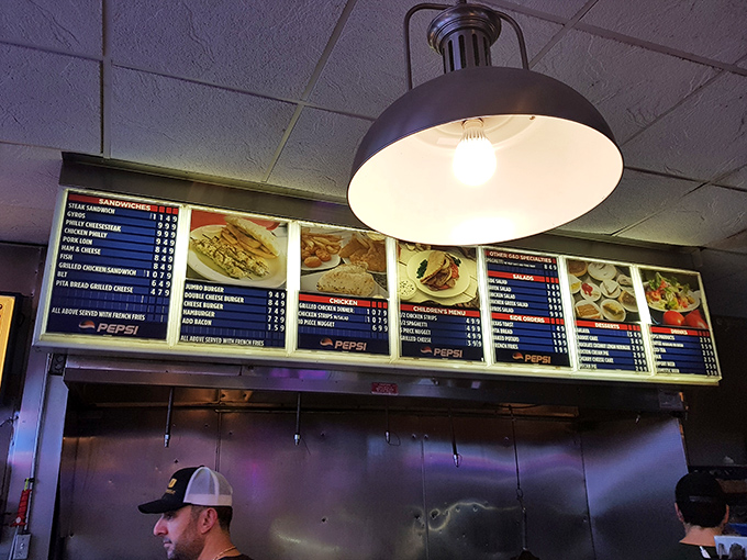 The menu board tells the whole story – straightforward American classics with Greek influences, no fancy descriptions needed. Just good food at honest prices.