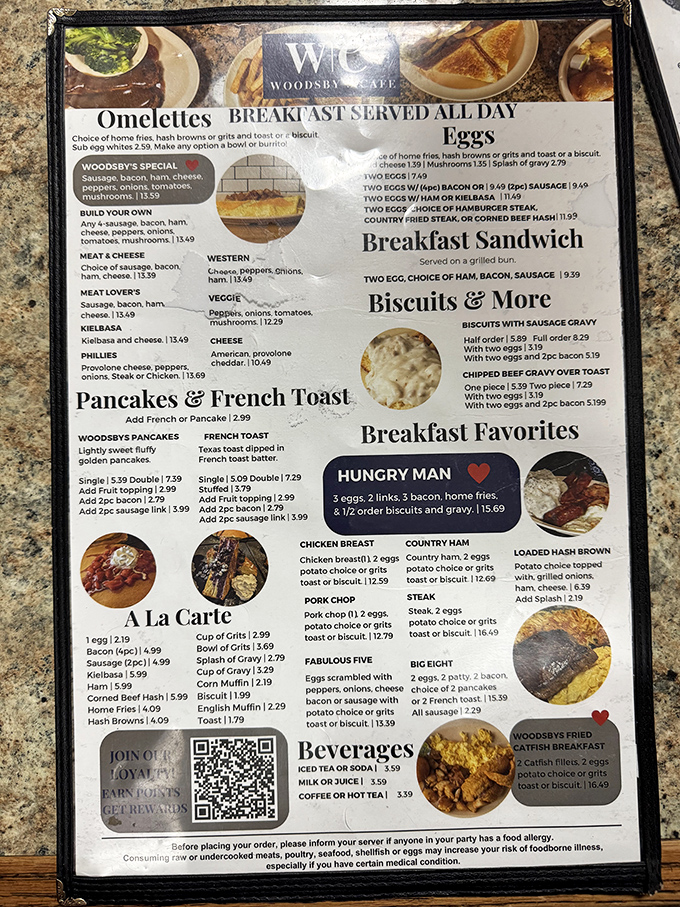 The menu reads like a love letter to American breakfast classics. Notice "Breakfast Served All Day"—four words that should be enshrined in the Constitution. P