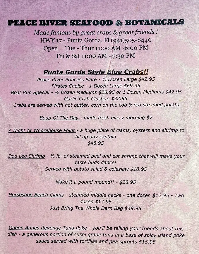 The menu reads like seafood poetry – "Dog Leg Shrimp" and "Queen Annes Revenge Tuna Poke" are just the opening verses.