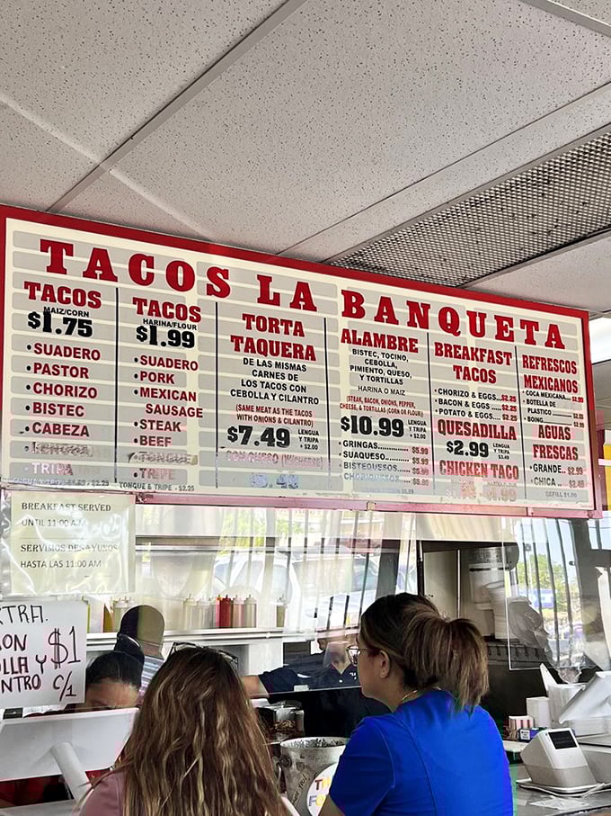 The menu board – a roadmap to happiness with prices that won't make your wallet weep. Study it like you're cramming for the most delicious exam ever.