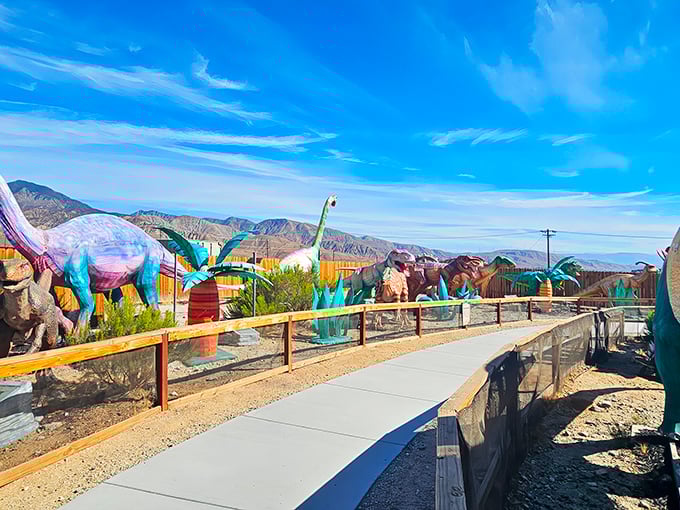 Follow the prehistoric path where colorful dinosaurs line the way like the world's most ancient welcoming committee.