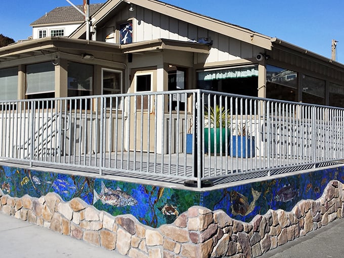That colorful marine mural isn't just decoration – it's a preview of what might end up on your plate at this seaside eatery.