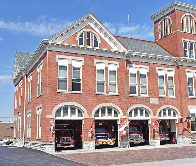 This isn't just a fire station—it's architectural eye candy with a purpose. Those arched doorways have been framing heroism since horses pulled the water wagons.