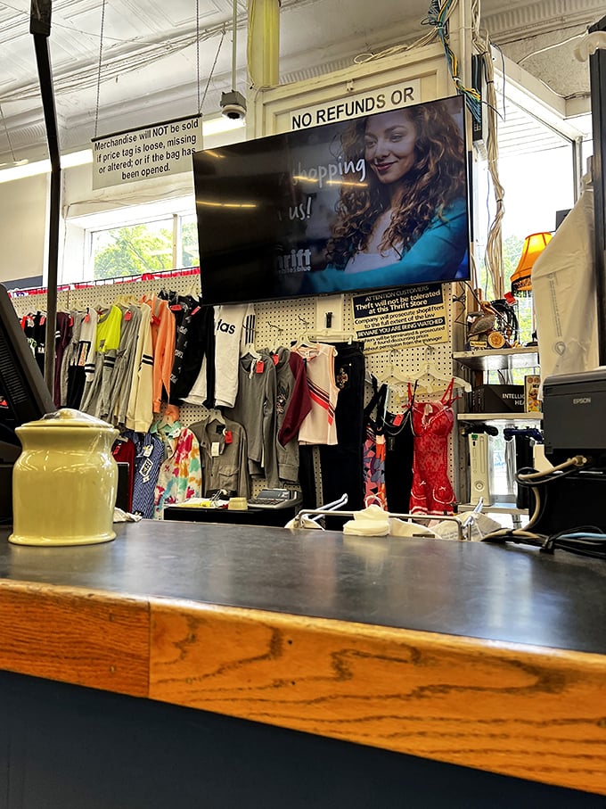 The checkout counter—final gateway between thrift store dreams and your closet's new reality. No fancy frills, just honest bargains.
