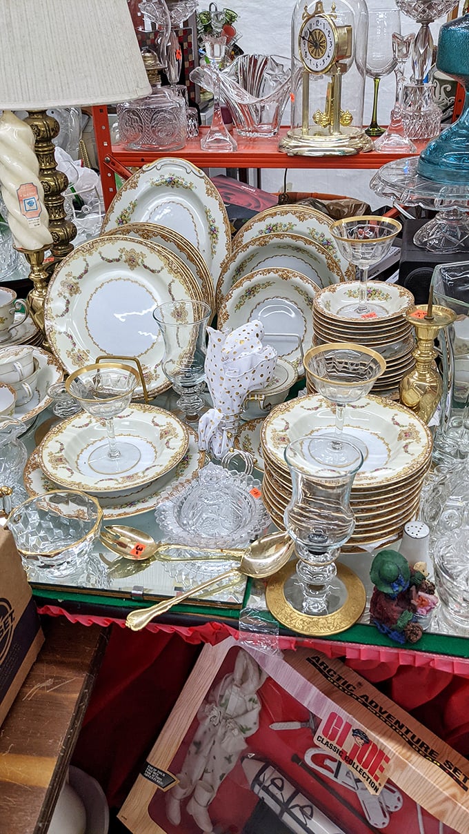 Grandma's china cabinet has nothing on this display! Elegant vintage dinnerware awaits new homes where they'll shine at future family gatherings.