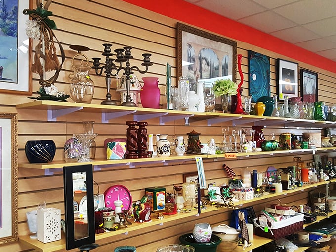 Shelves lined with yesterday's treasures become tomorrow's conversation pieces. Each glass candleholder and colorful vase has lived a previous life.